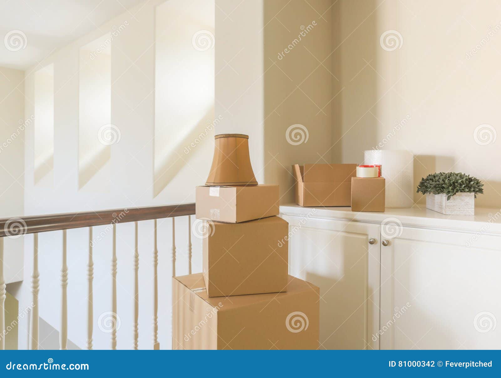 Variety of Packed Moving Boxes in Empty Room Stock Photo - Image of ...