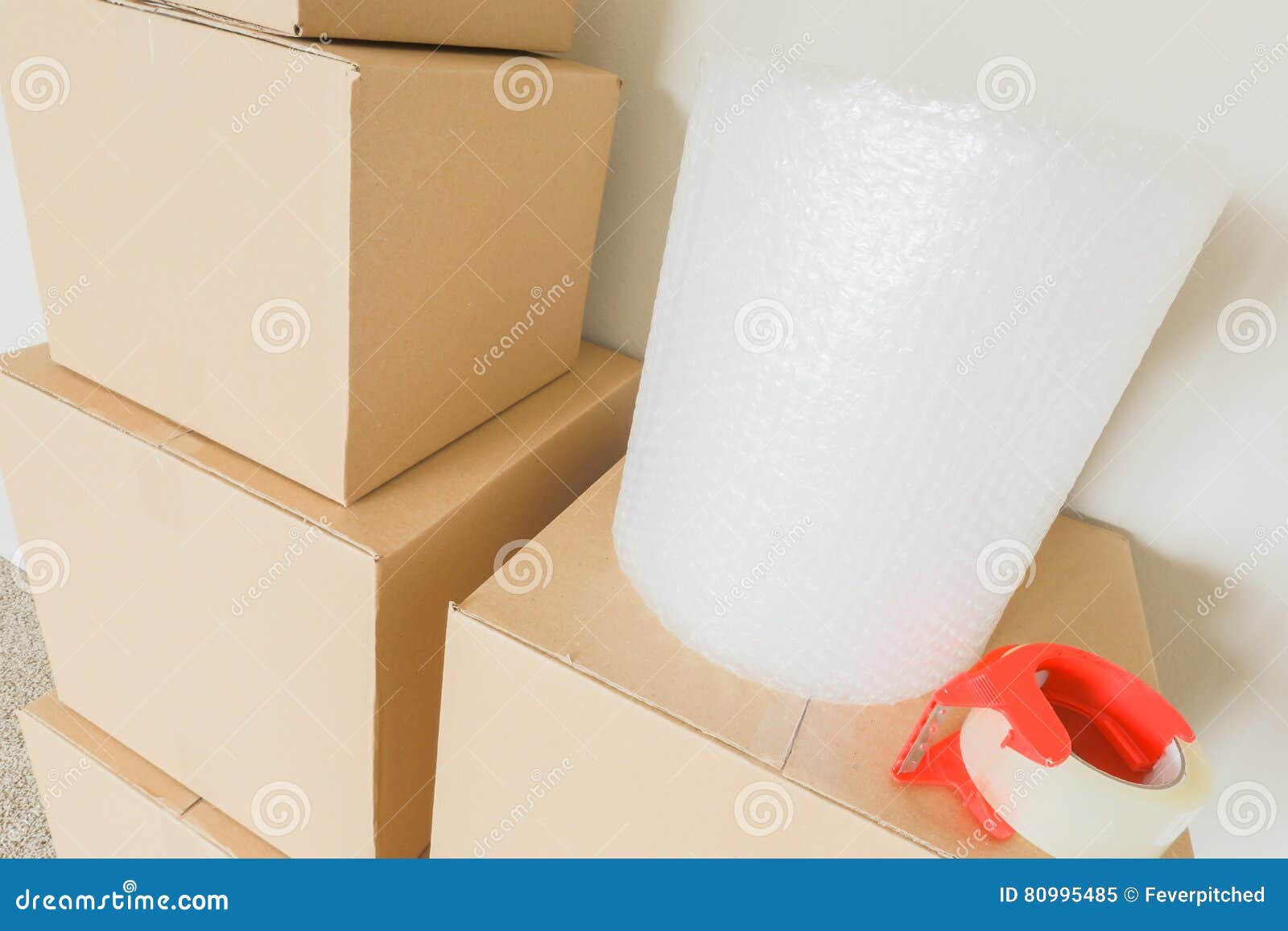 Variety of Packed Moving Boxes in Empty Room Stock Image - Image of ...