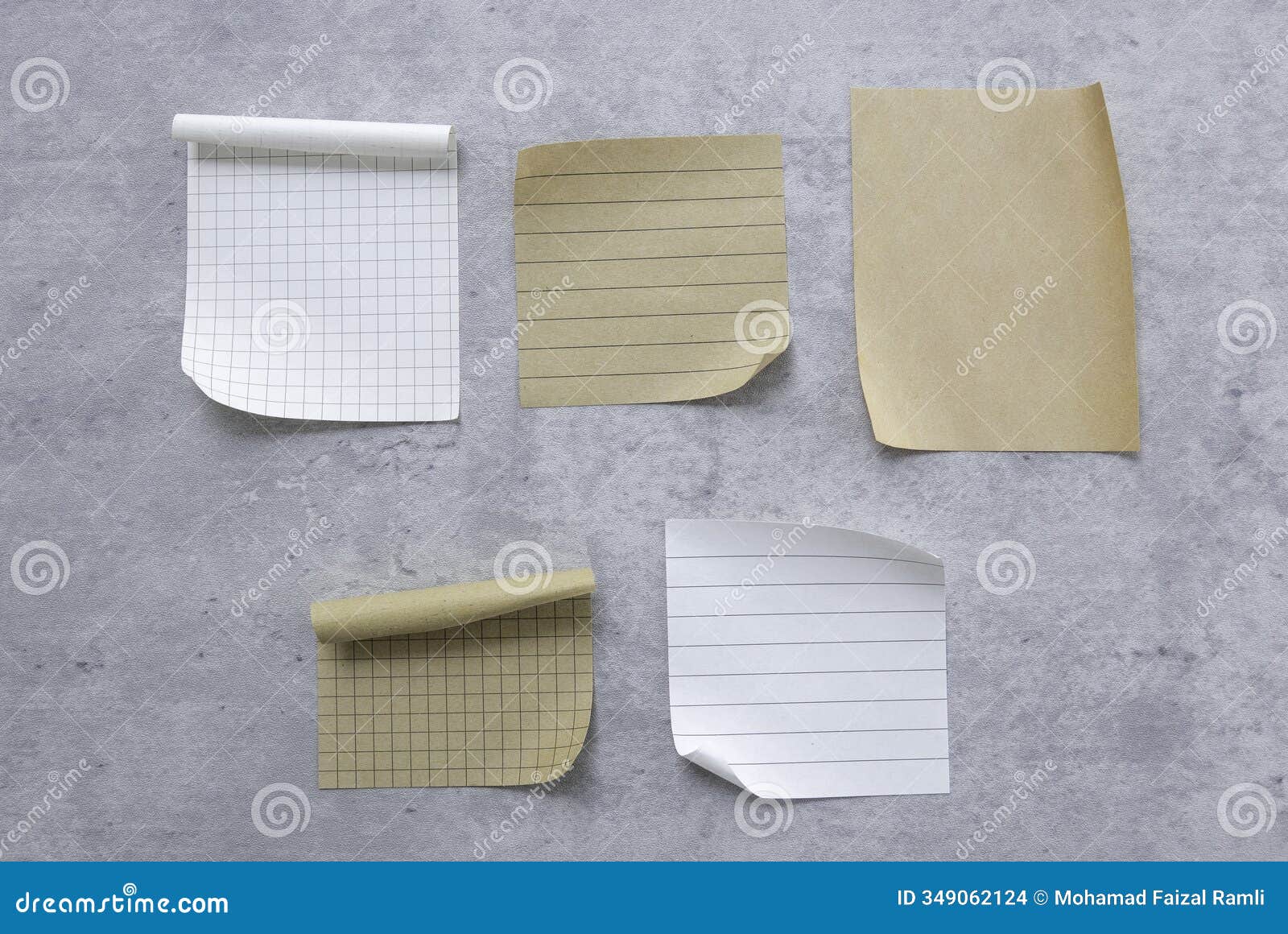 Variety of Paper Types: Lined, Grid, and Plain Sheets on a Gray Surface ...