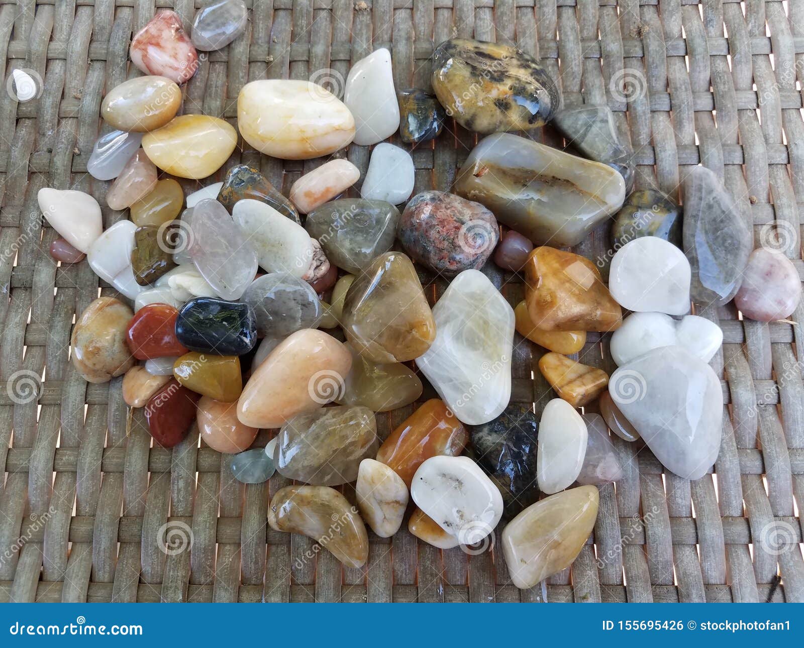 Variety of Polished Rocks or Stones on Surface Stock Photo - Image of ...