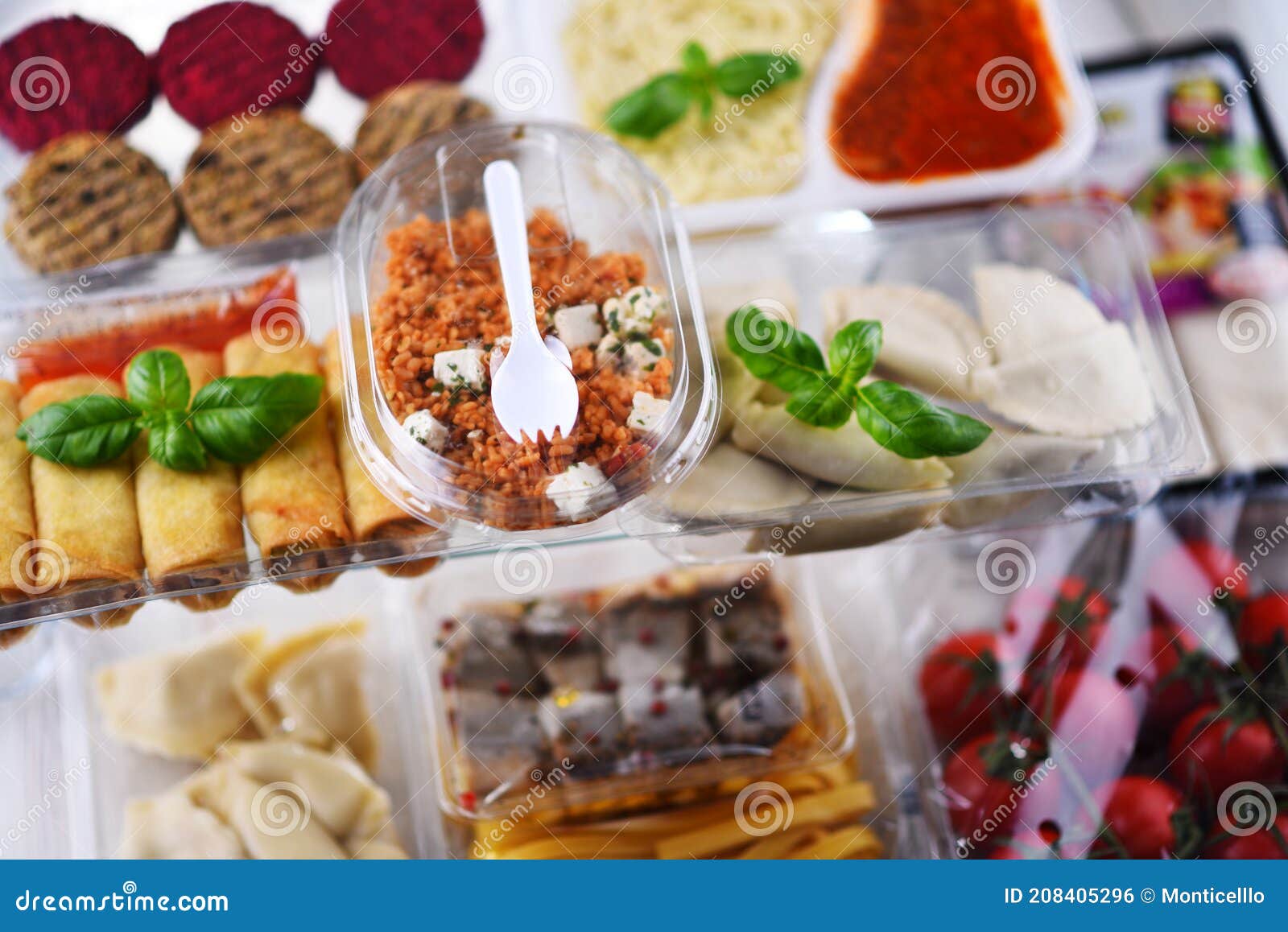 A Variety of Prepackaged Food Products in Plastic Boxes Stock Photo ...