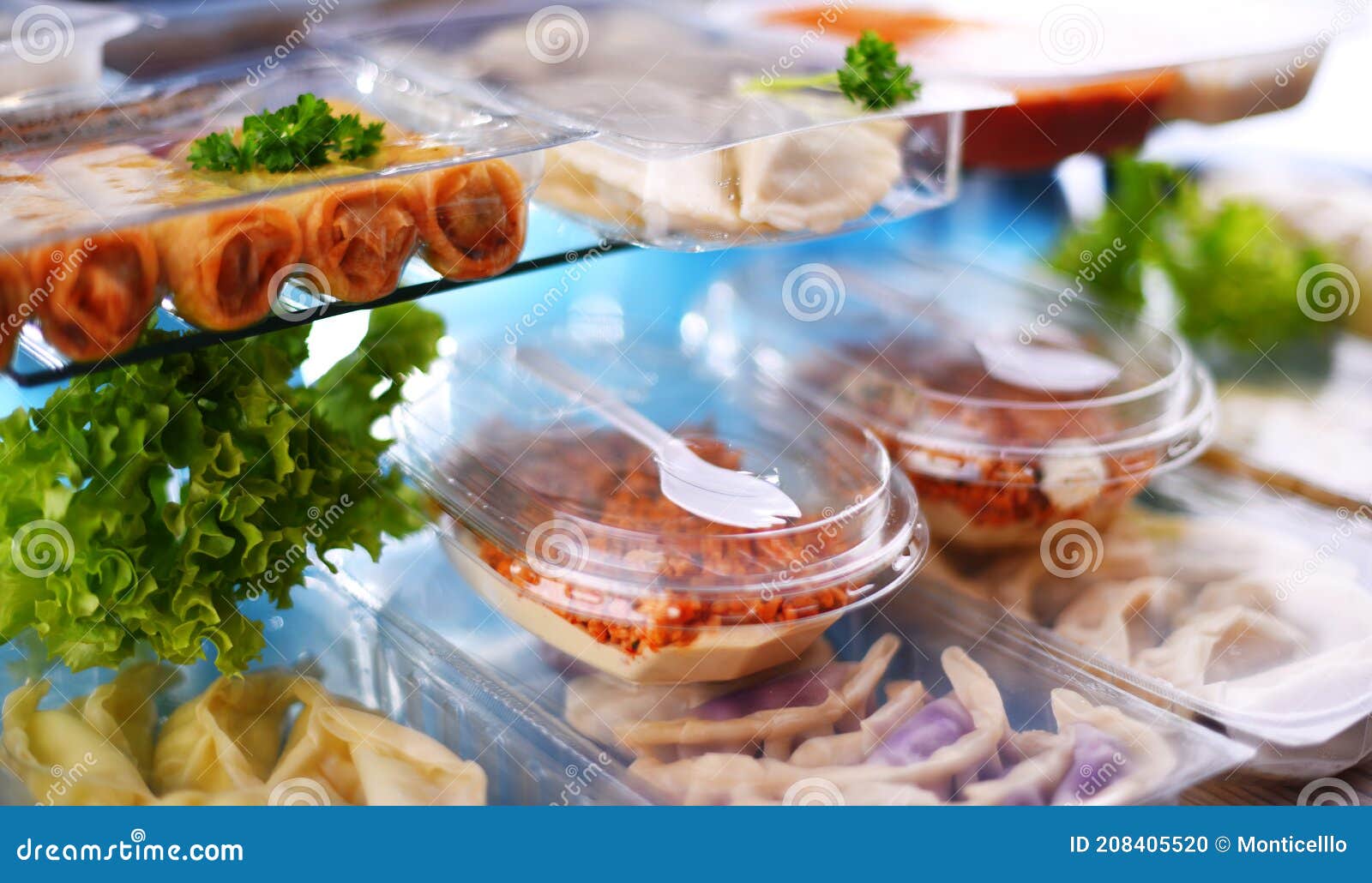 A Variety of Prepackaged Food Products in Plastic Boxes Stock Photo ...