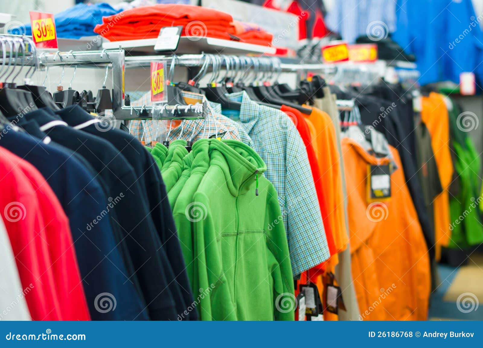Variety of Shirts, T-shirts and Sweaters Stock Photo - Image of mall ...