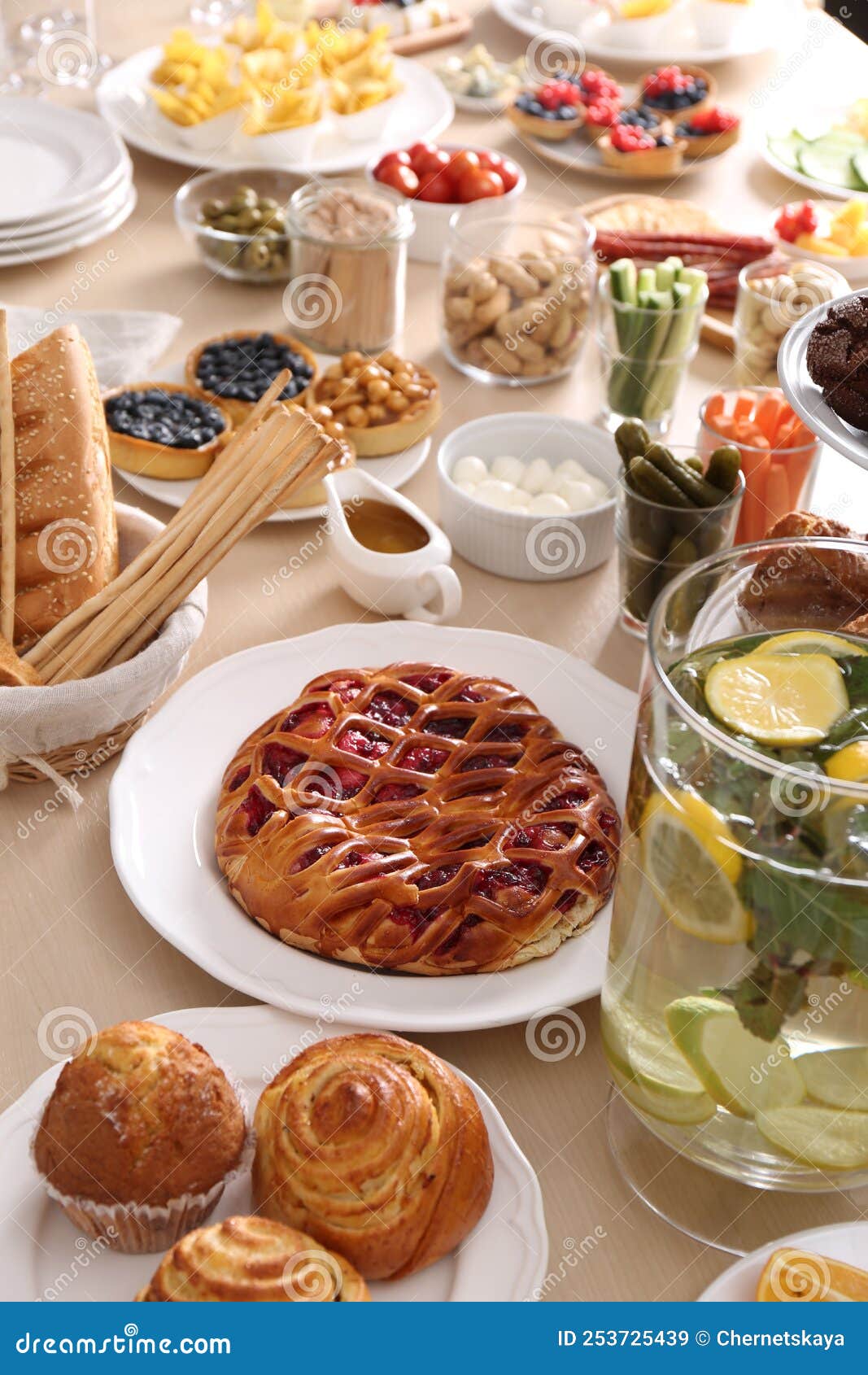 Variety of Snacks on Wooden Table in Buffet Style Stock Image - Image ...