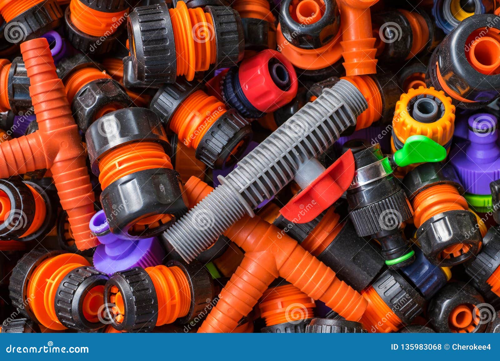 Various Adapter for Watering Hoses on the Garden Market. Stock Photo ...