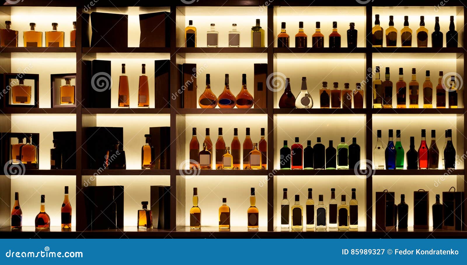 Various Alcohol Bottles in a Bar, Back Light, Logos Removed Stock Image ...