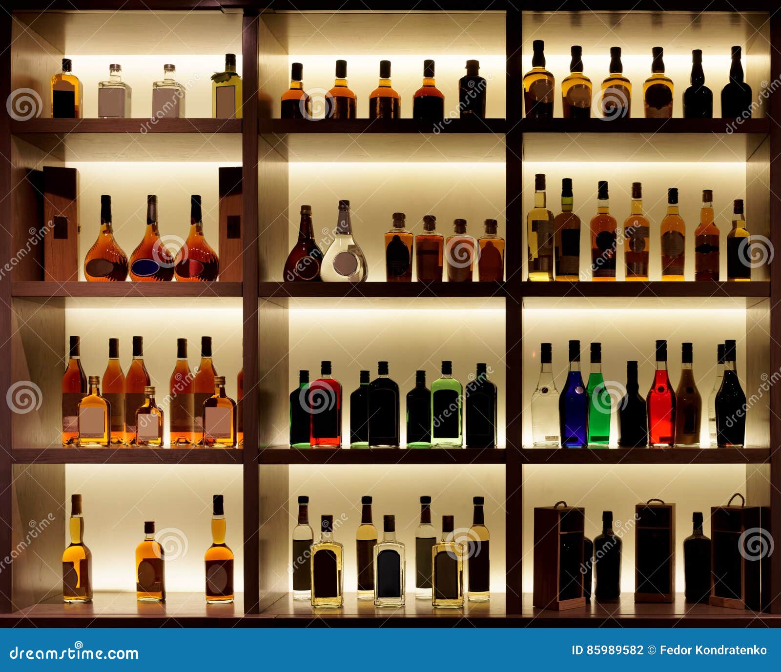 Various Alcohol Bottles in a Bar, Back Light, Logos Removed Stock Photo ...