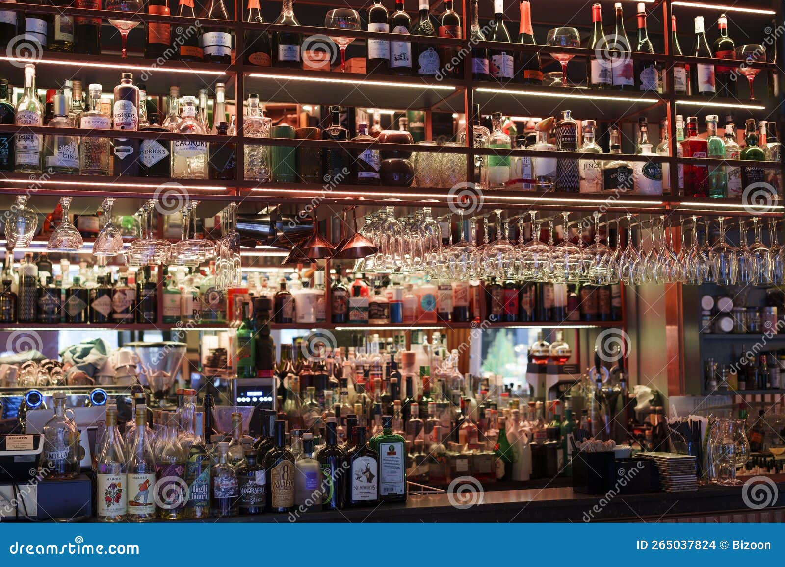 Various Alcohol Bottles Displayed in a Pub Editorial Stock Image ...