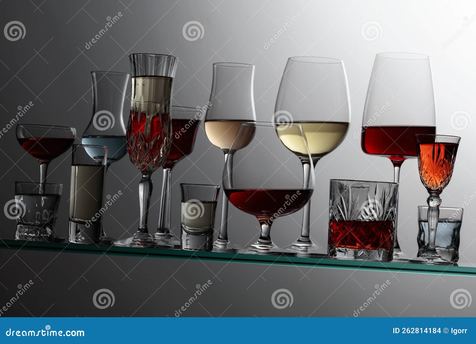 Alcoholic Drinks on a Tilted Glass Shelf Stock Photo - Image of bright ...