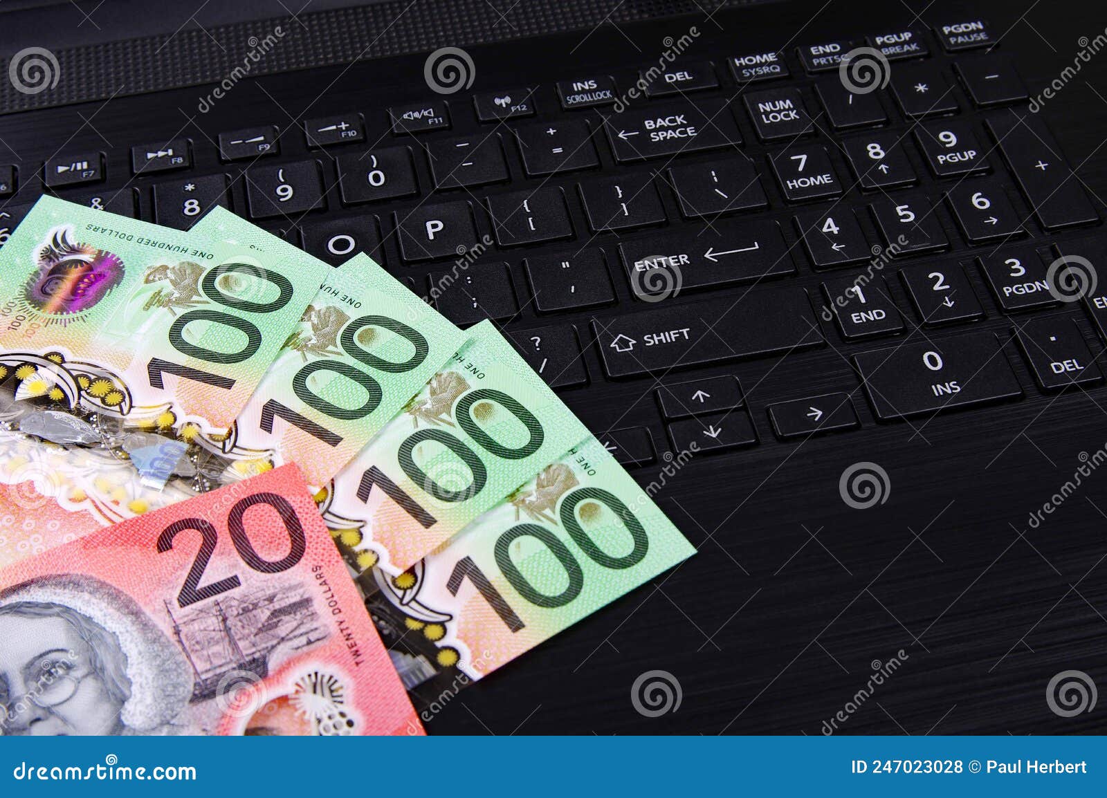 Various Bank Notes on a Computer Keyboard Stock Photo - Image of ...