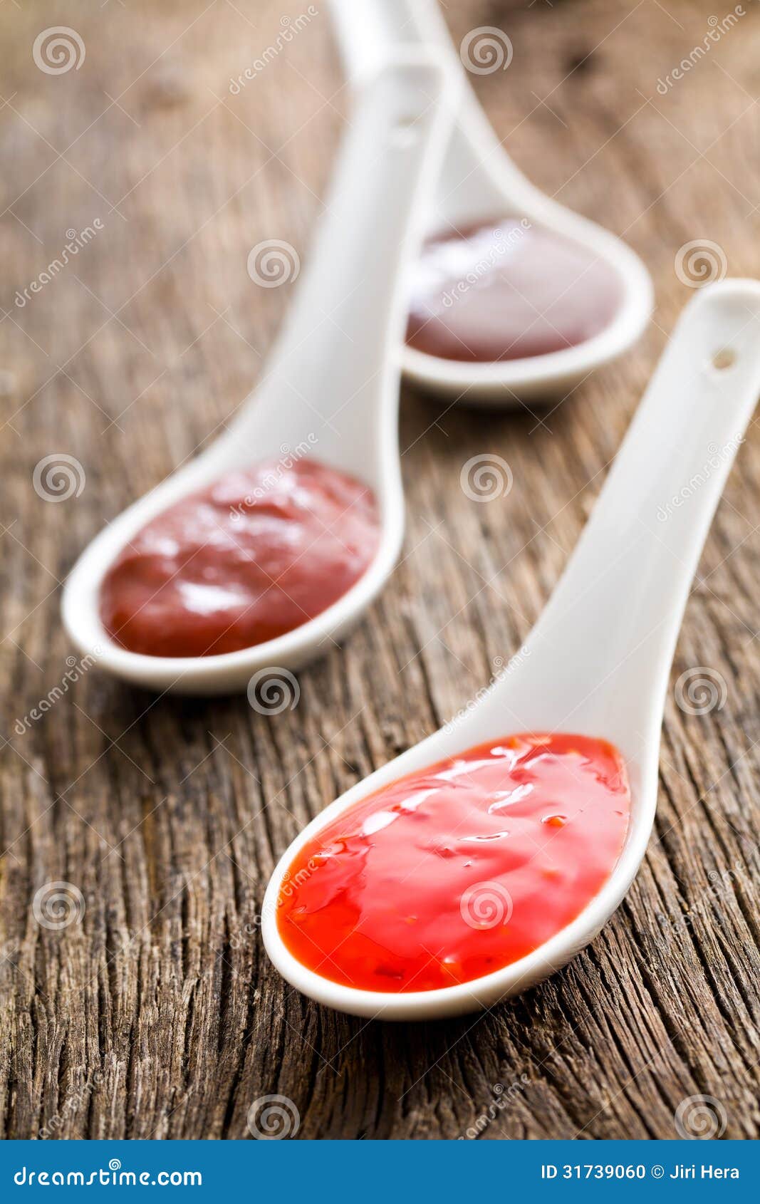 Various Barbecue Sauces in Ceramic Spoons Stock Photo - Image of sauce ...