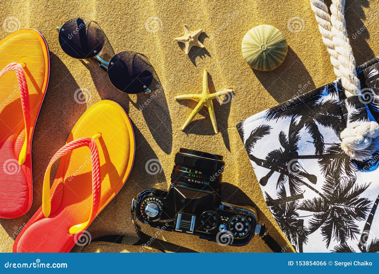 Various Beach Items on Sand Stock Photo - Image of souvenir, flatlay ...