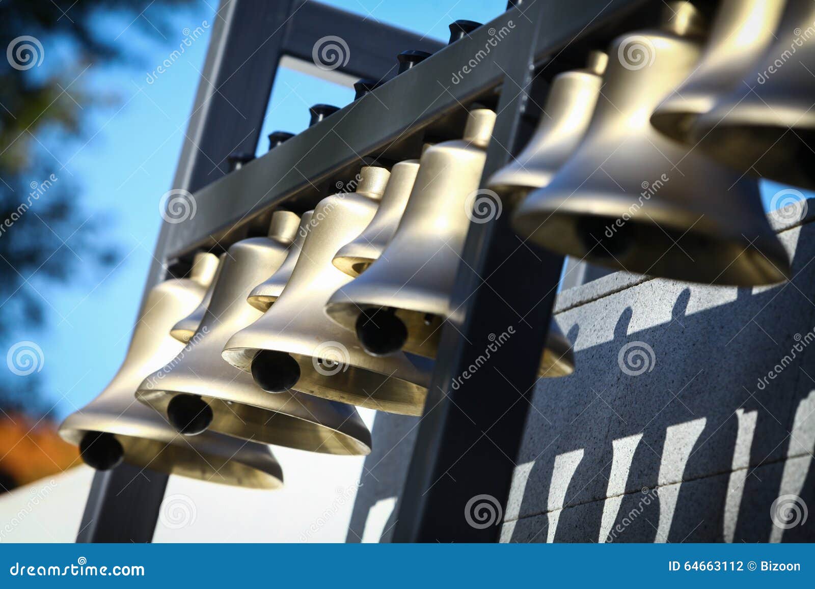 Various bells in a row stock photo. Image of sound, bell - 64663112