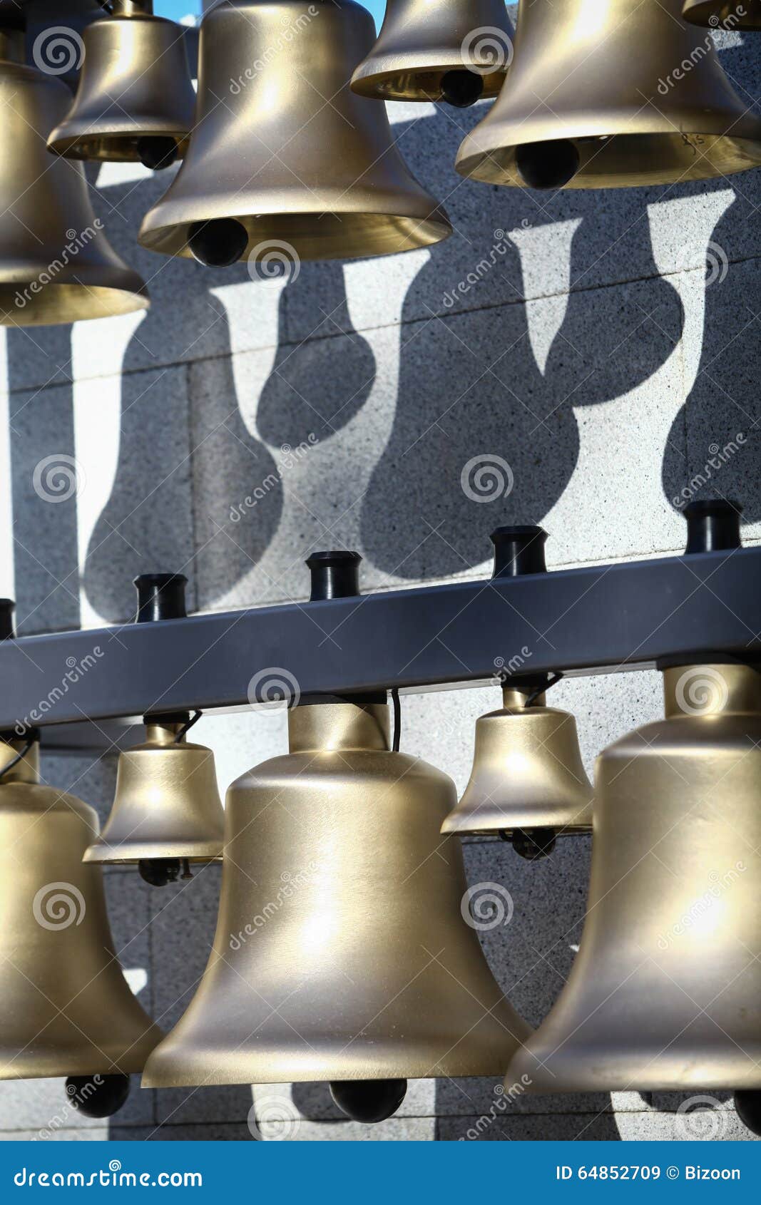 Various bells in a row stock image. Image of brass, classic - 64852709