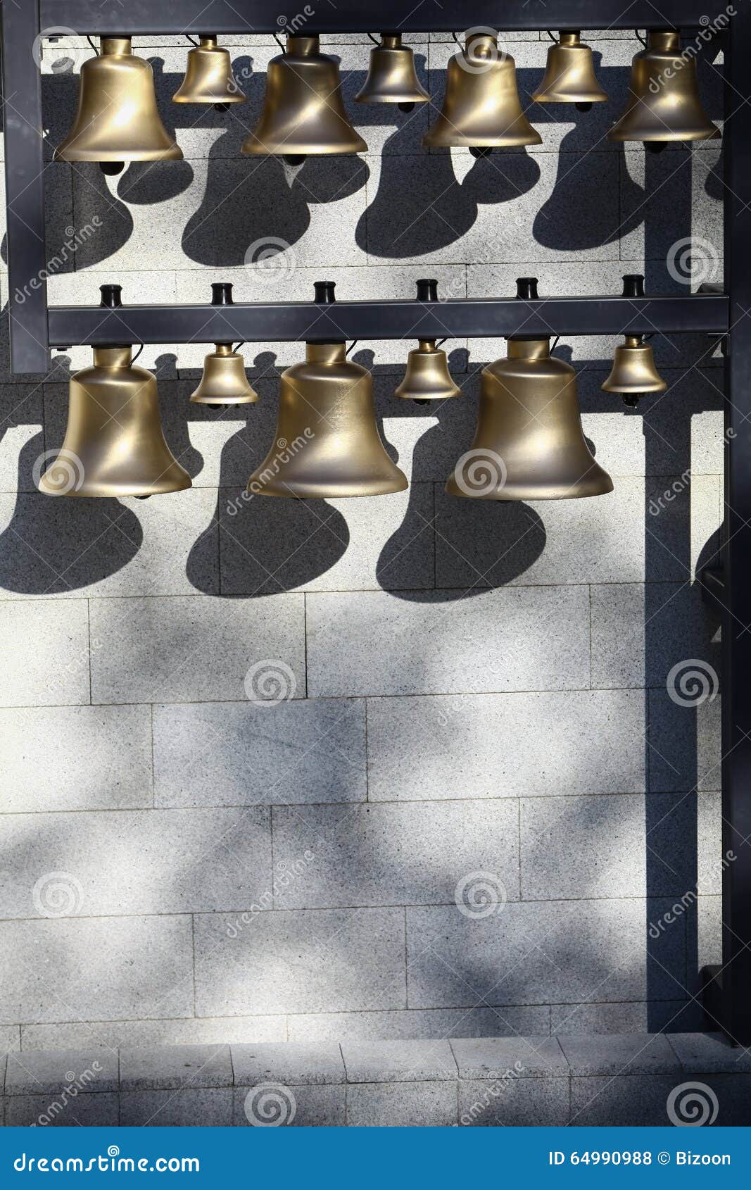 Various bells in a row stock photo. Image of brass, shiny - 64990988
