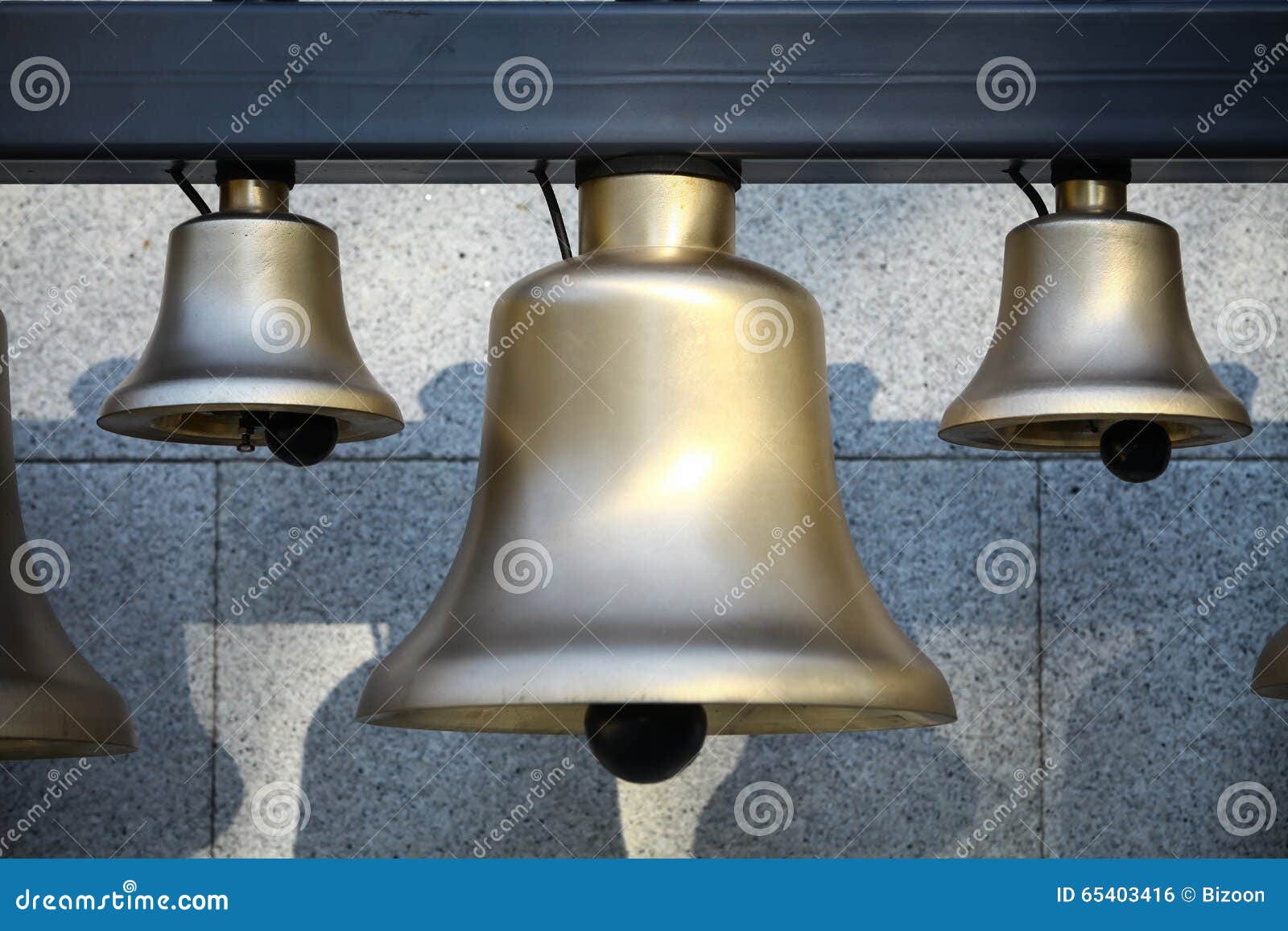Various bells in a row stock photo. Image of bronze, object - 65403416