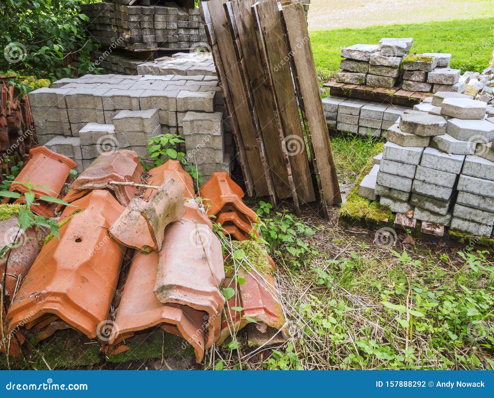 Various Building Materials on the Grass Stock Photo - Image of boards ...