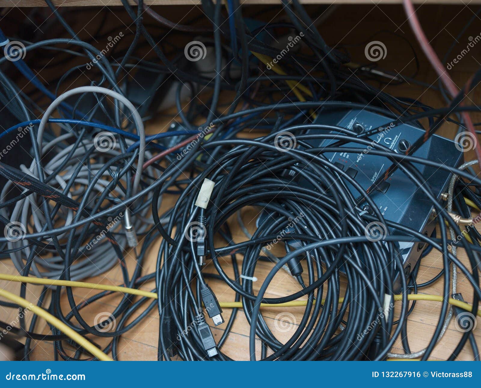 Cables in mess stock photo. Image of chaos, mess, floor - 132267916