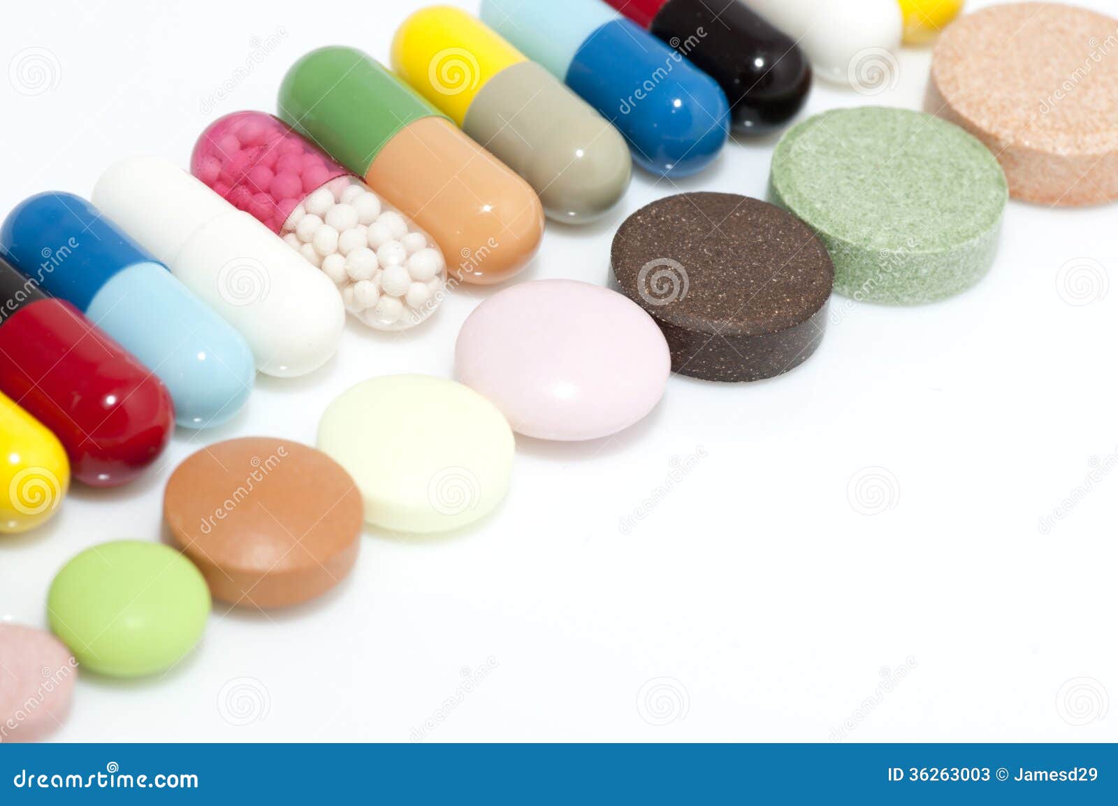 Various Capsules and Tablets in Row Stock Image - Image of pill ...