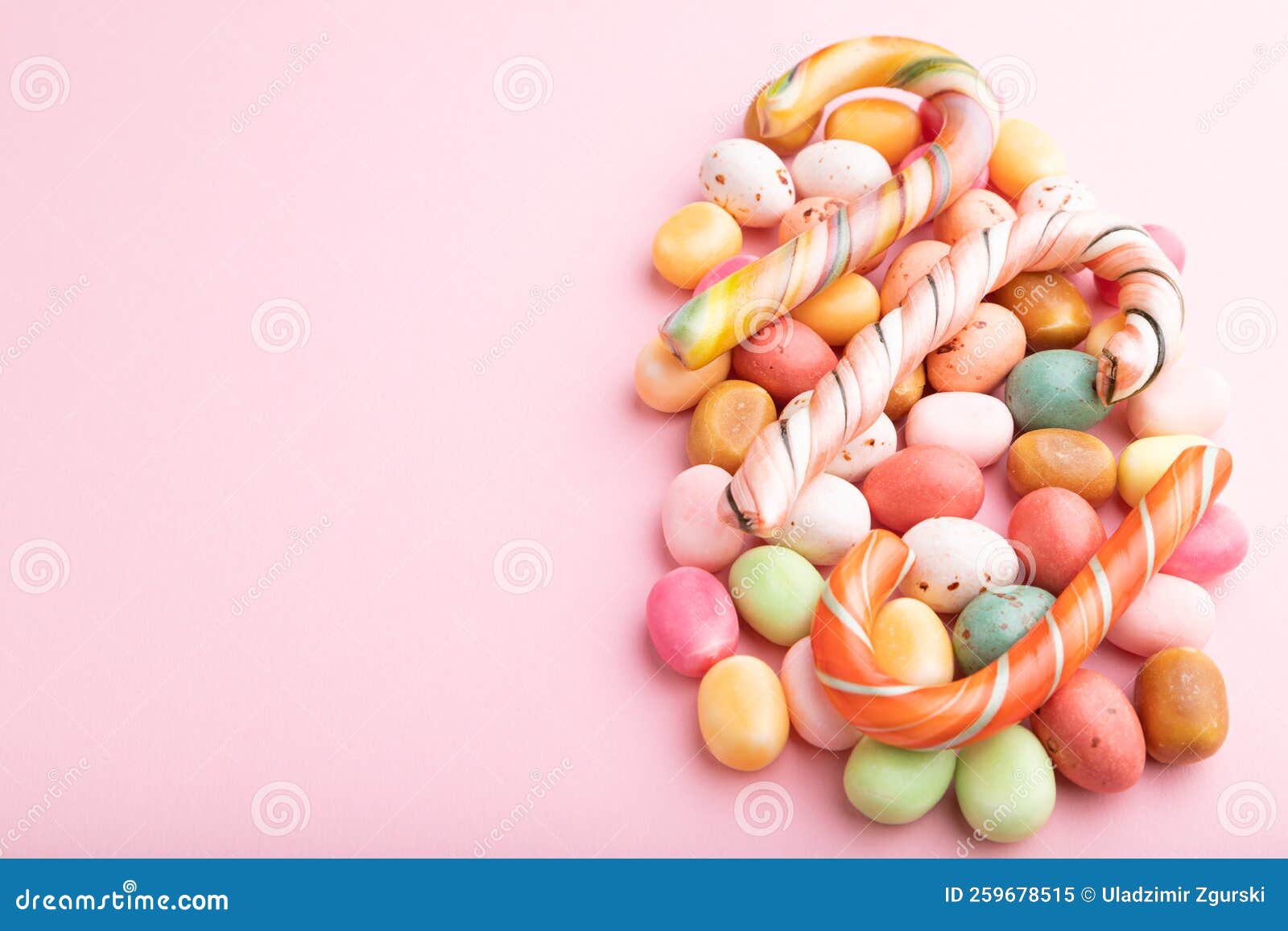 Various Caramel Candies on Pink Background. Copy Space, Side View Stock ...