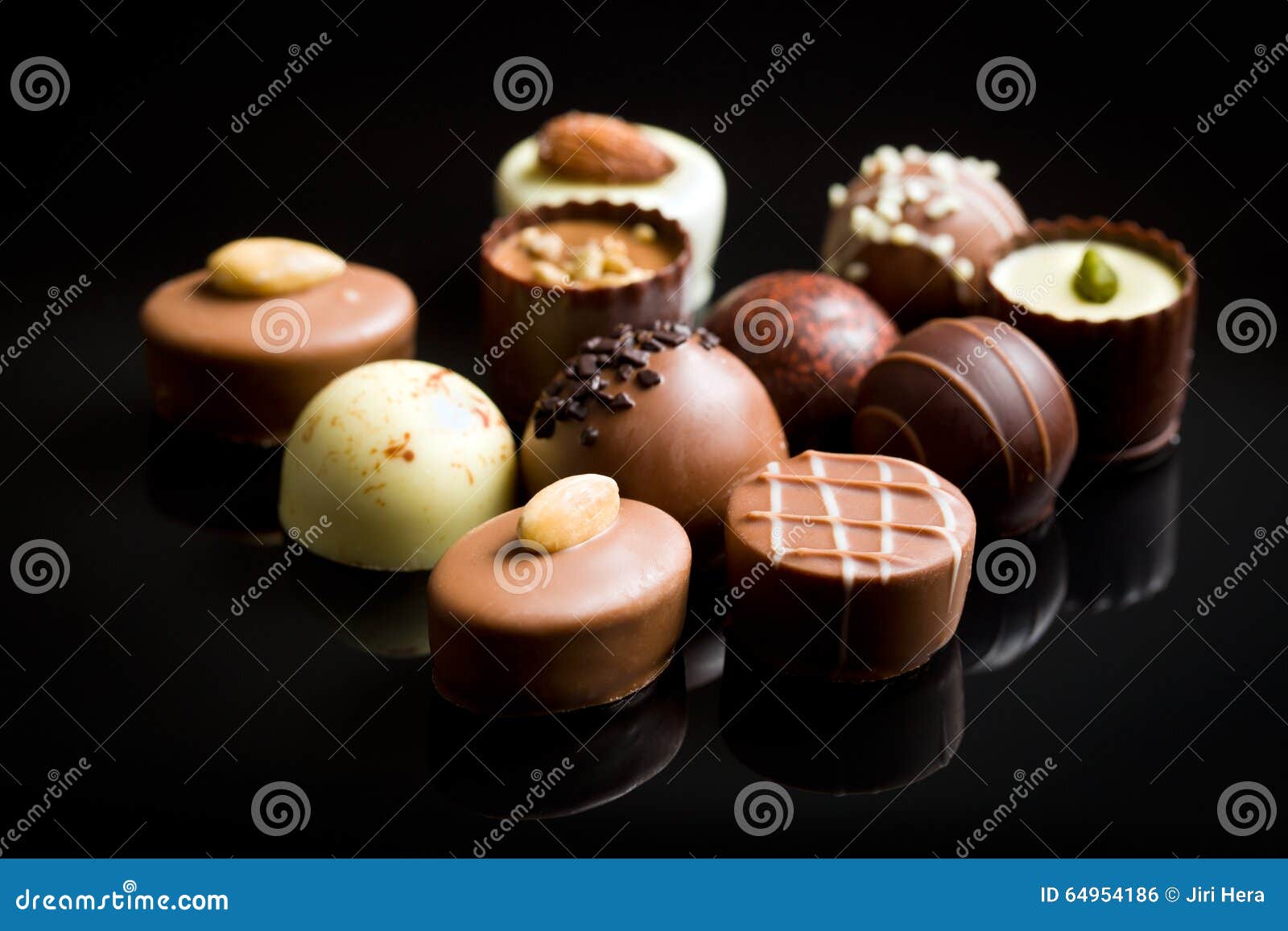 Various chocolate pralines stock photo. Image of gourmet - 64954186