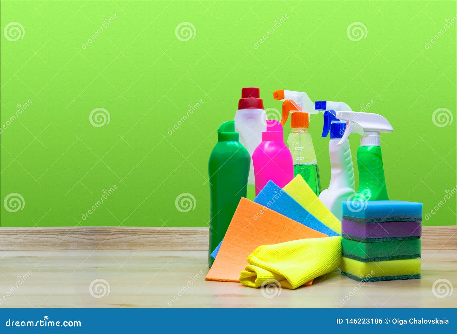 Various Cleaning Items On A Green Background Stock Photo - Image of ...