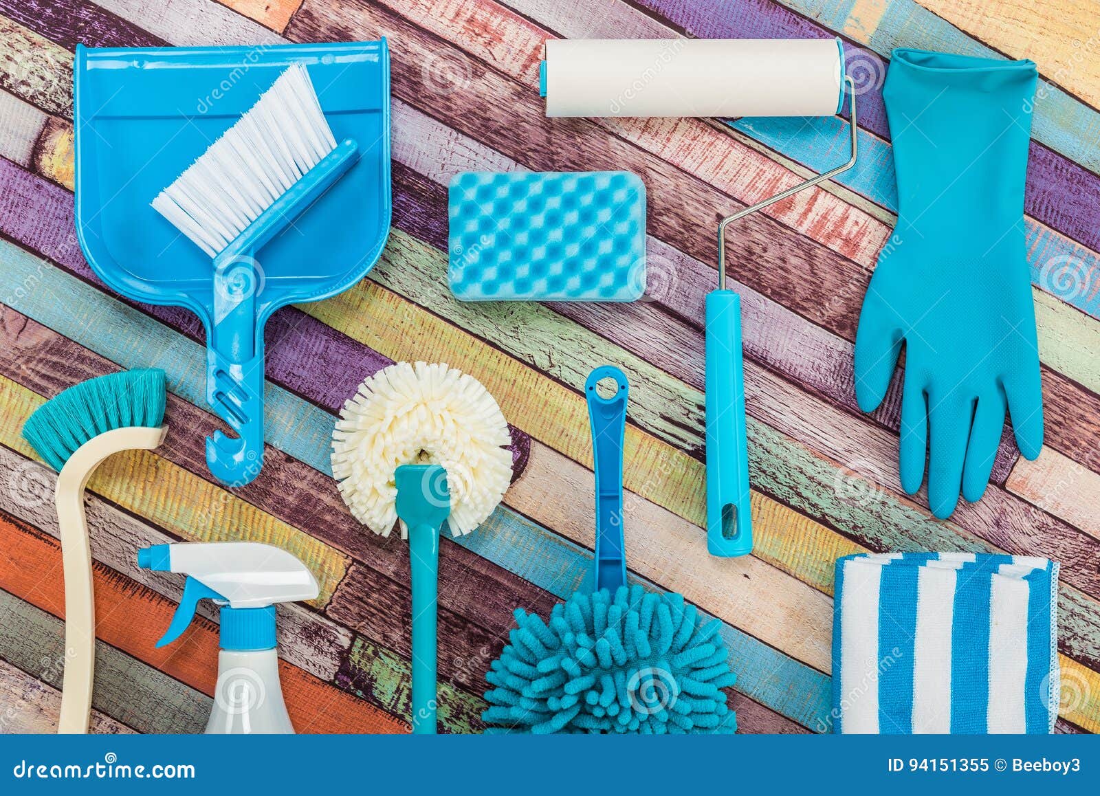 Various Cleaning Tools Placed on a Colorful Table Stock Image - Image ...