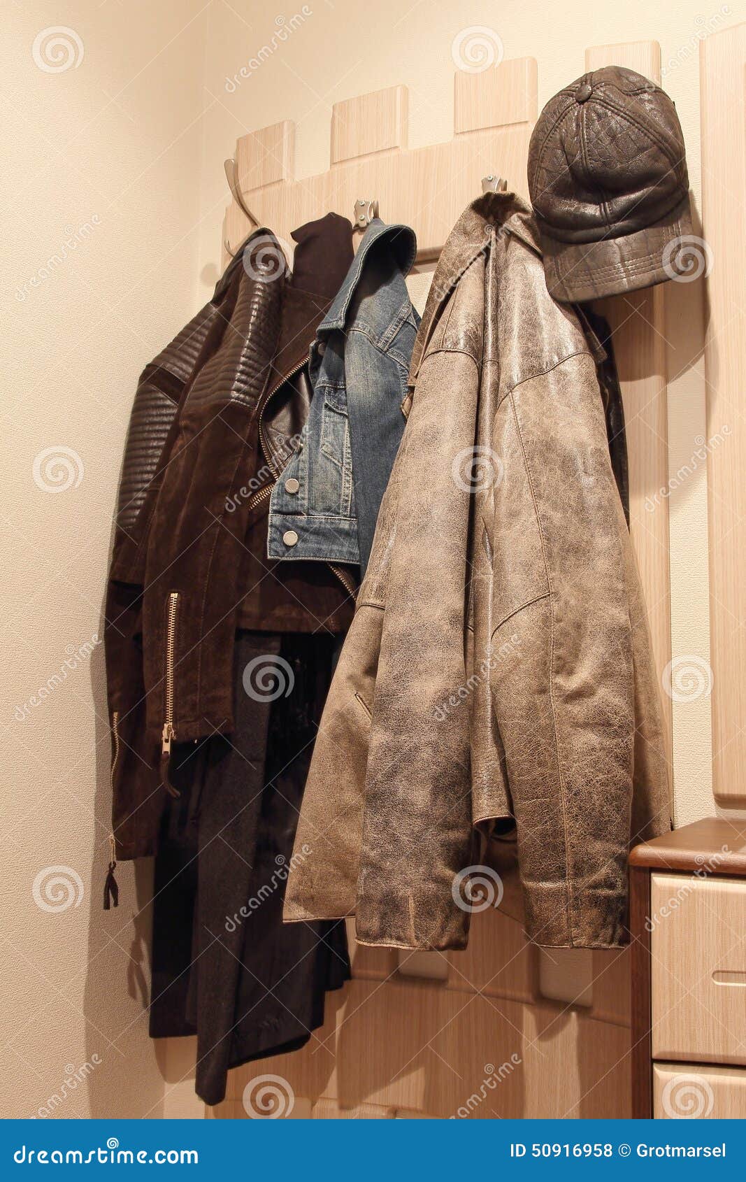 Various Clothes Hanging on Coat Rack. Stock Photo - Image of clothes ...