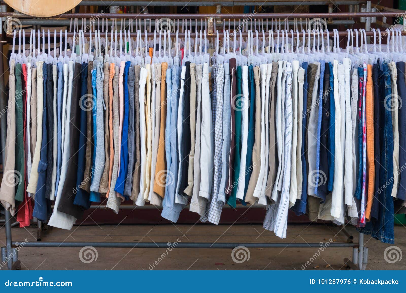 Various Collection Pants Hanging on a Rack. Stock Photo - Image of ...