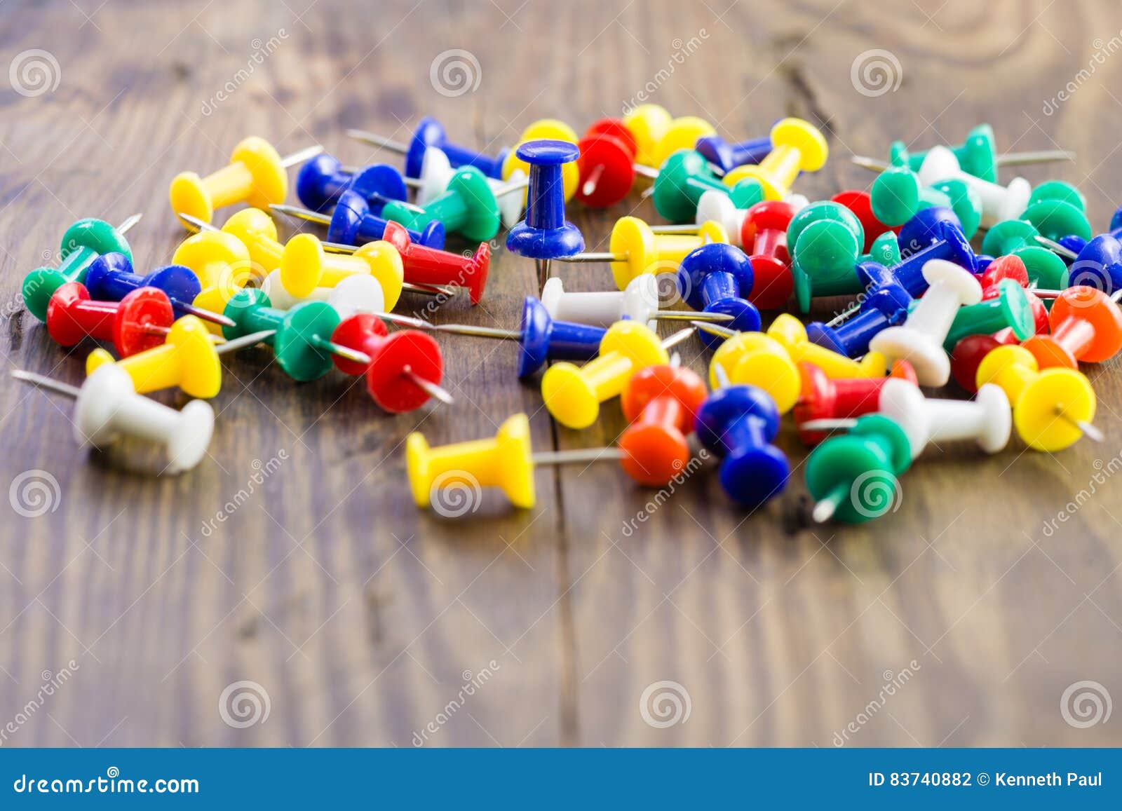 Various Color Thumbtacks on Distressed Wood Stock Photo - Image of wood ...