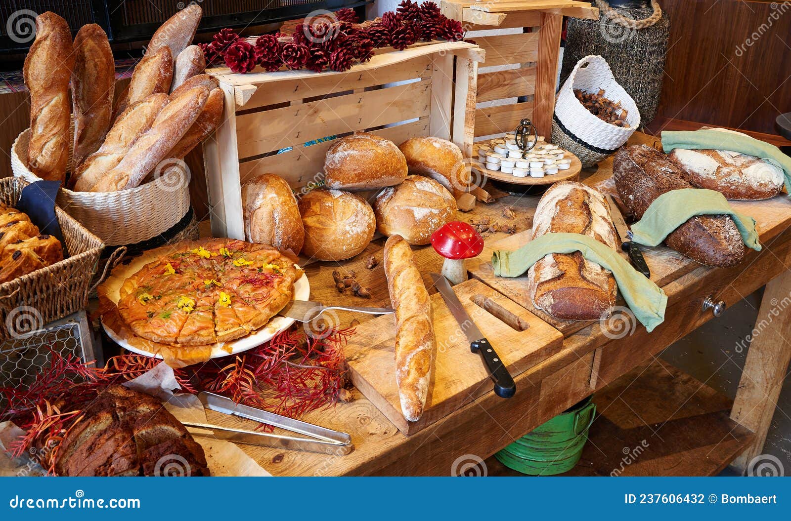Various Colored Baked Bread Buffet on Butcher Board Stock Photo - Image ...