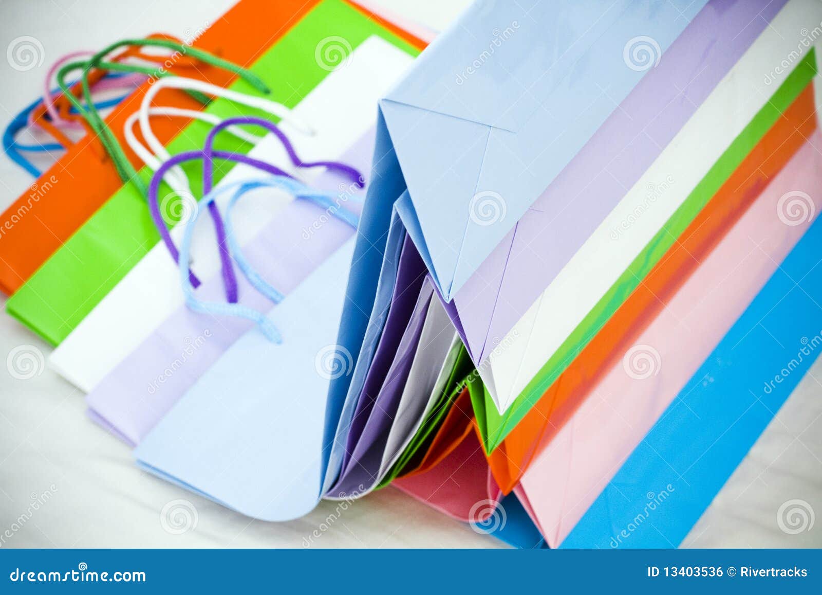 Various Colorful Empty Gift Paper Bags Stacked Stock Photo - Image of ...