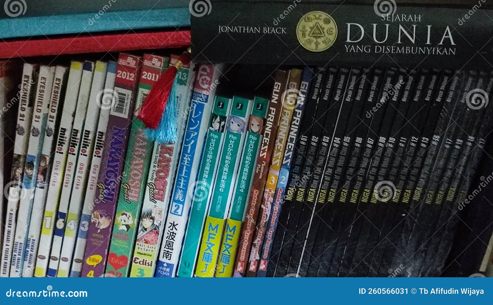 Various Comics and Books Placed on the Bookshelf Editorial Photo ...