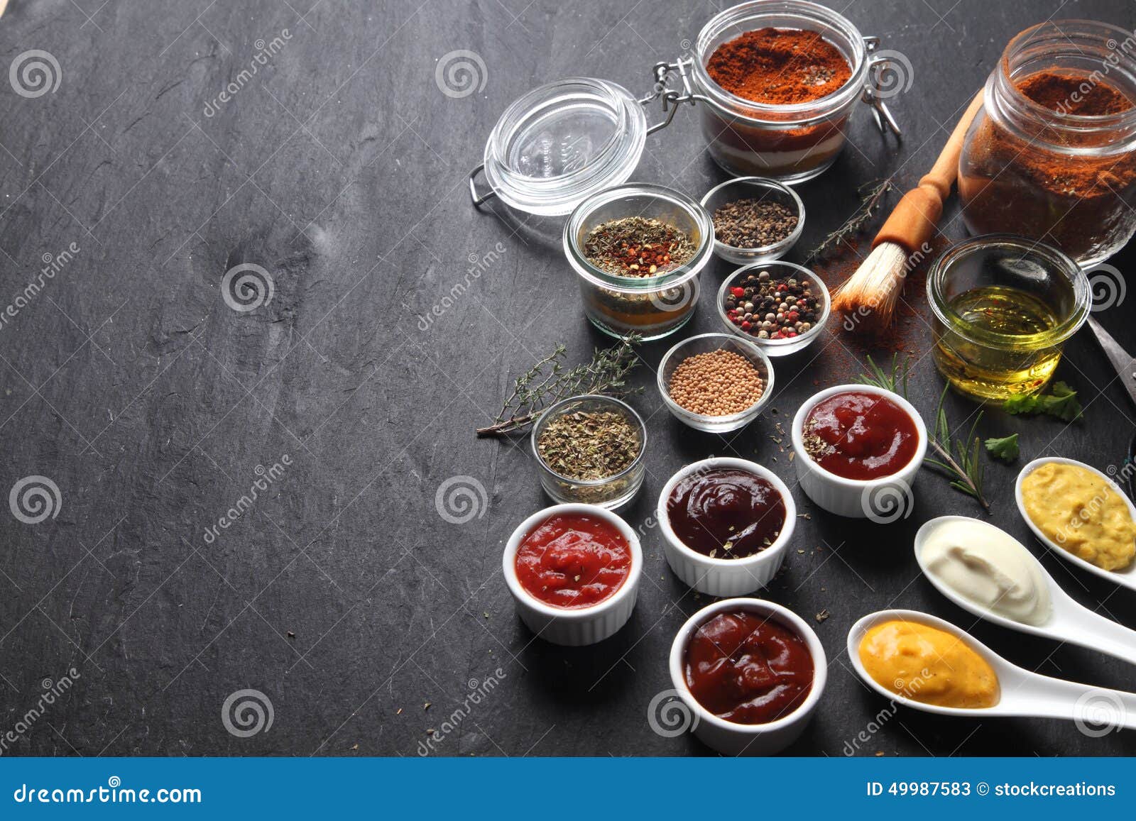 Various Condiments on Table with Copy Space Stock Image - Image of ...