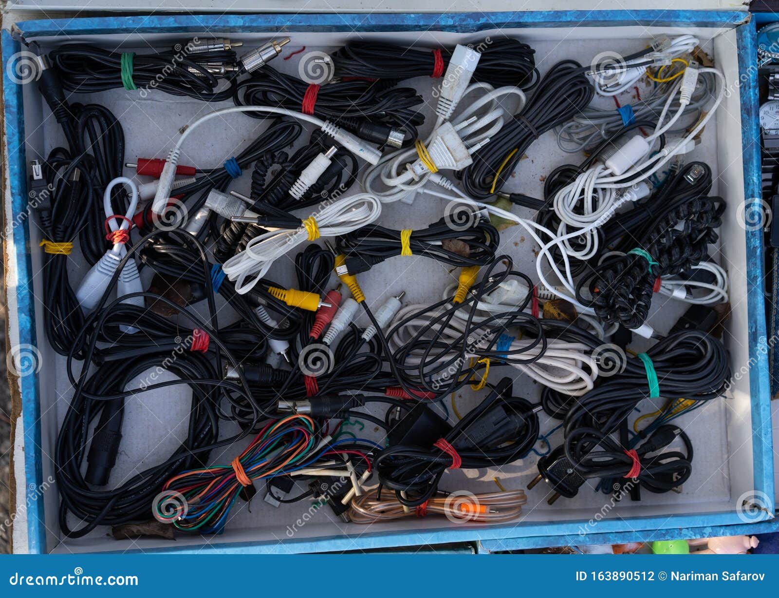 Various Connecting Cables in a Box on Top Stock Photo - Image of black ...