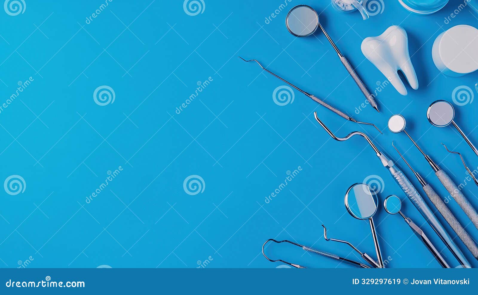 Various Dental Tools on a Clean Blue Background with Copy Space Stock ...