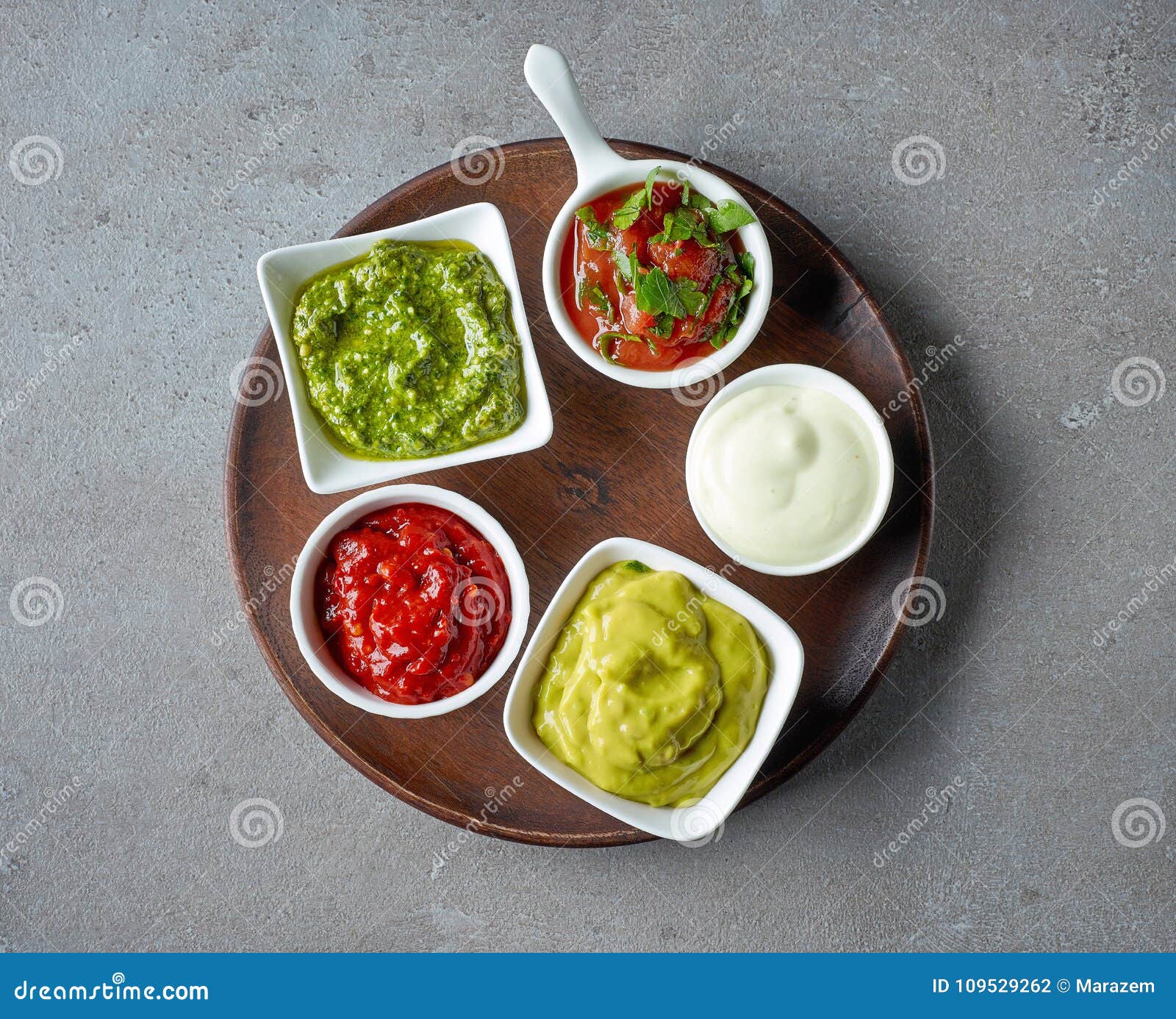 Various Sauces on Grey Table Stock Photo - Image of green, savory ...