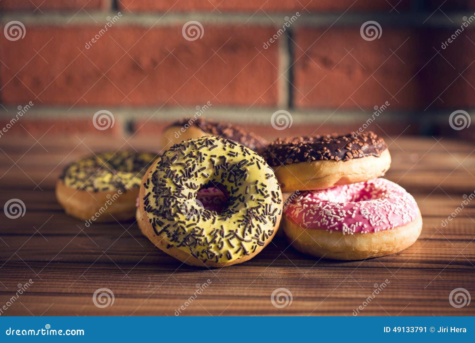 Various Donuts on Wooden Table Stock Image - Image of fried, doughnut ...