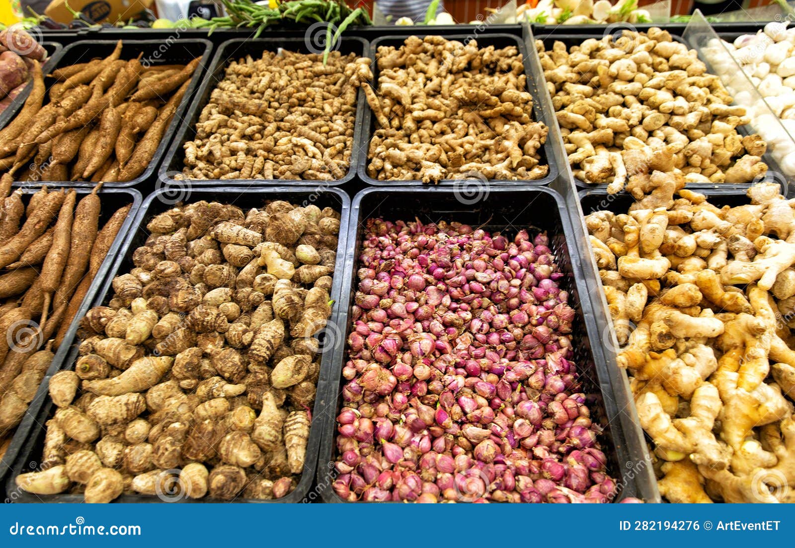 Various Edible Healthy Root Vegetables in Market Showcase Stock Photo ...