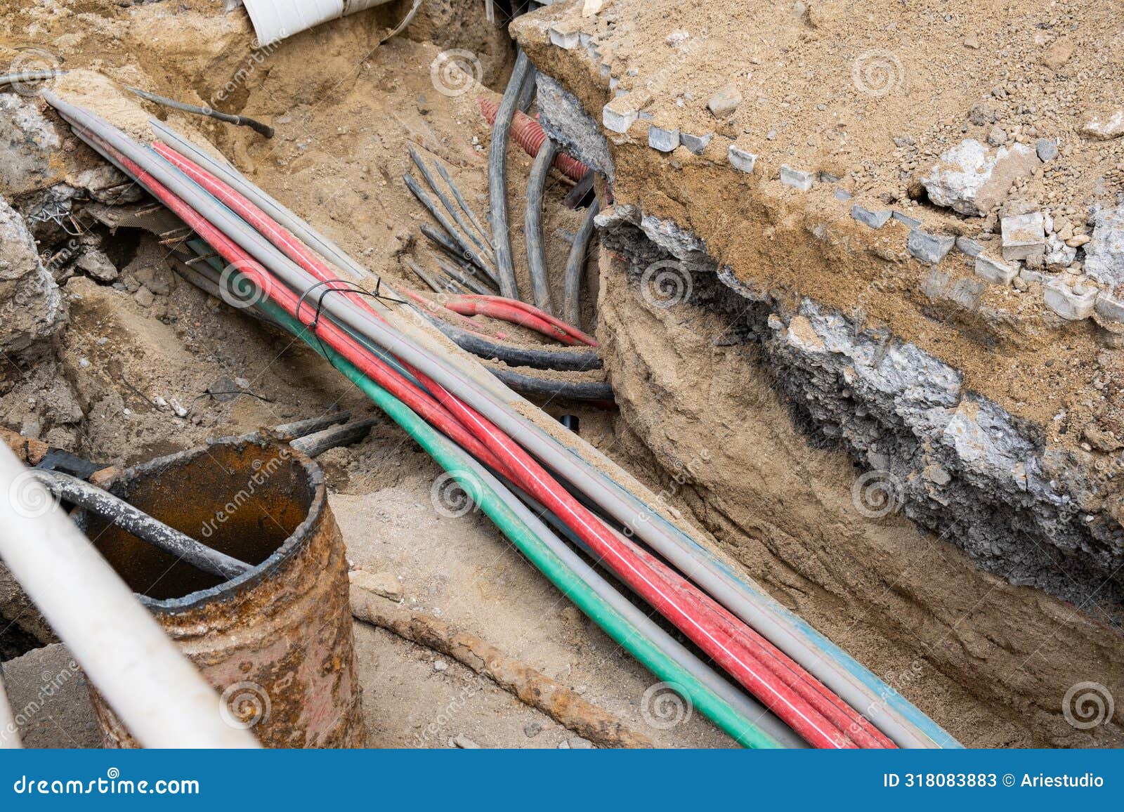 Various Electrical Cables Dug Out from the Ground on the Street Laying ...