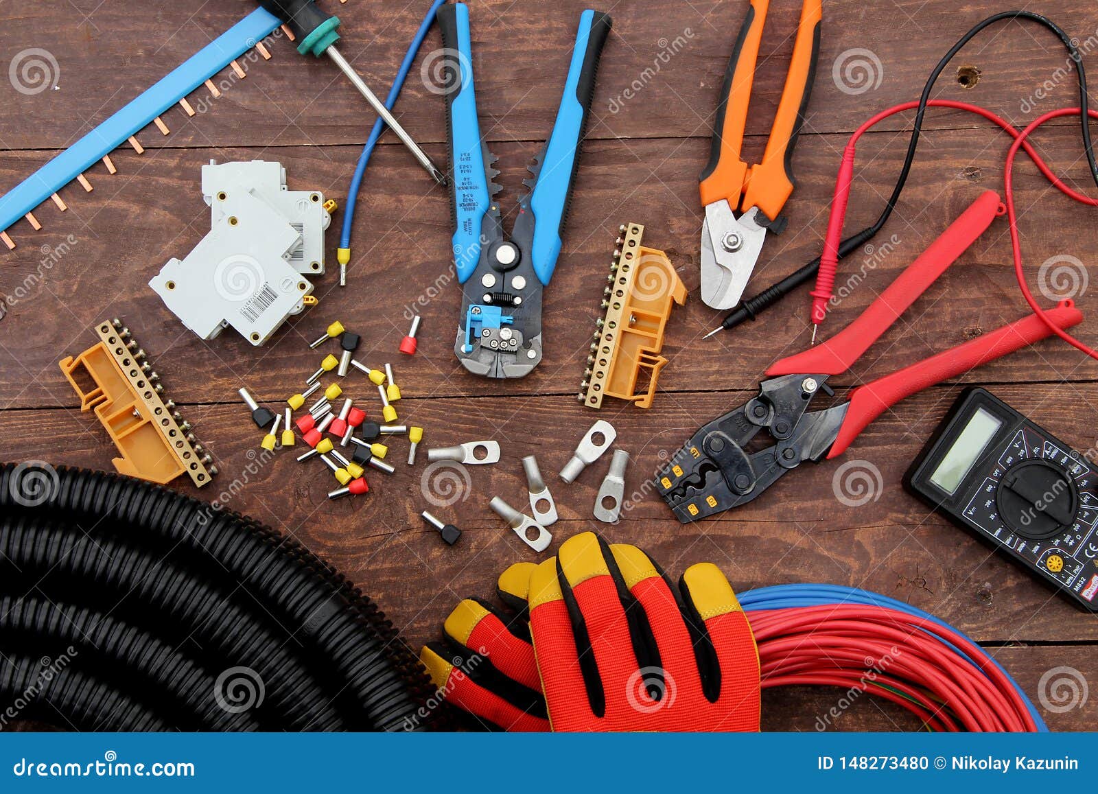 Tools for Electrical Work Laid Out on a Wooden Surface of Brown. Top ...