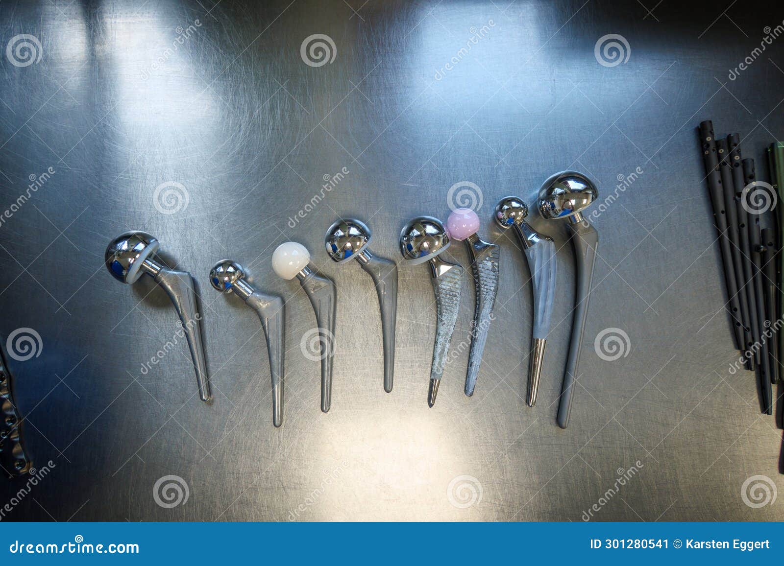 Various Explanted Hip Joint Prostheses Lying Next To Each Other on the ...