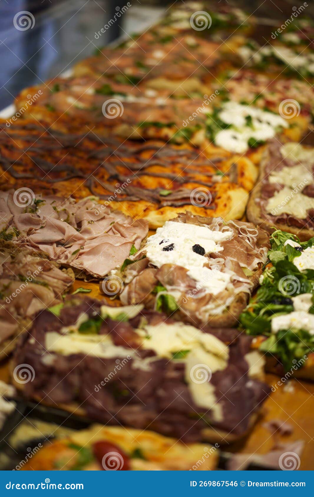 Various Flavors Pizza Cut into Square Slices Stock Photo - Image of ...