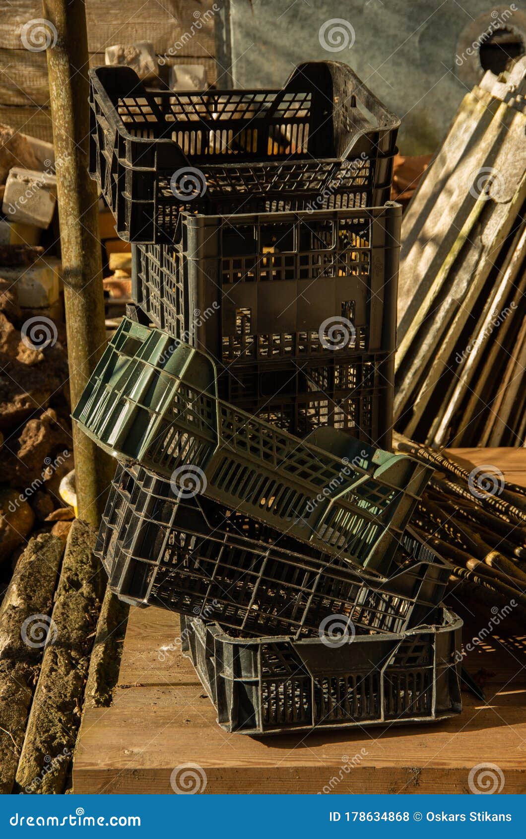 Various Garden Plastic Boxes on a Wooden Platform Stock Photo - Image ...