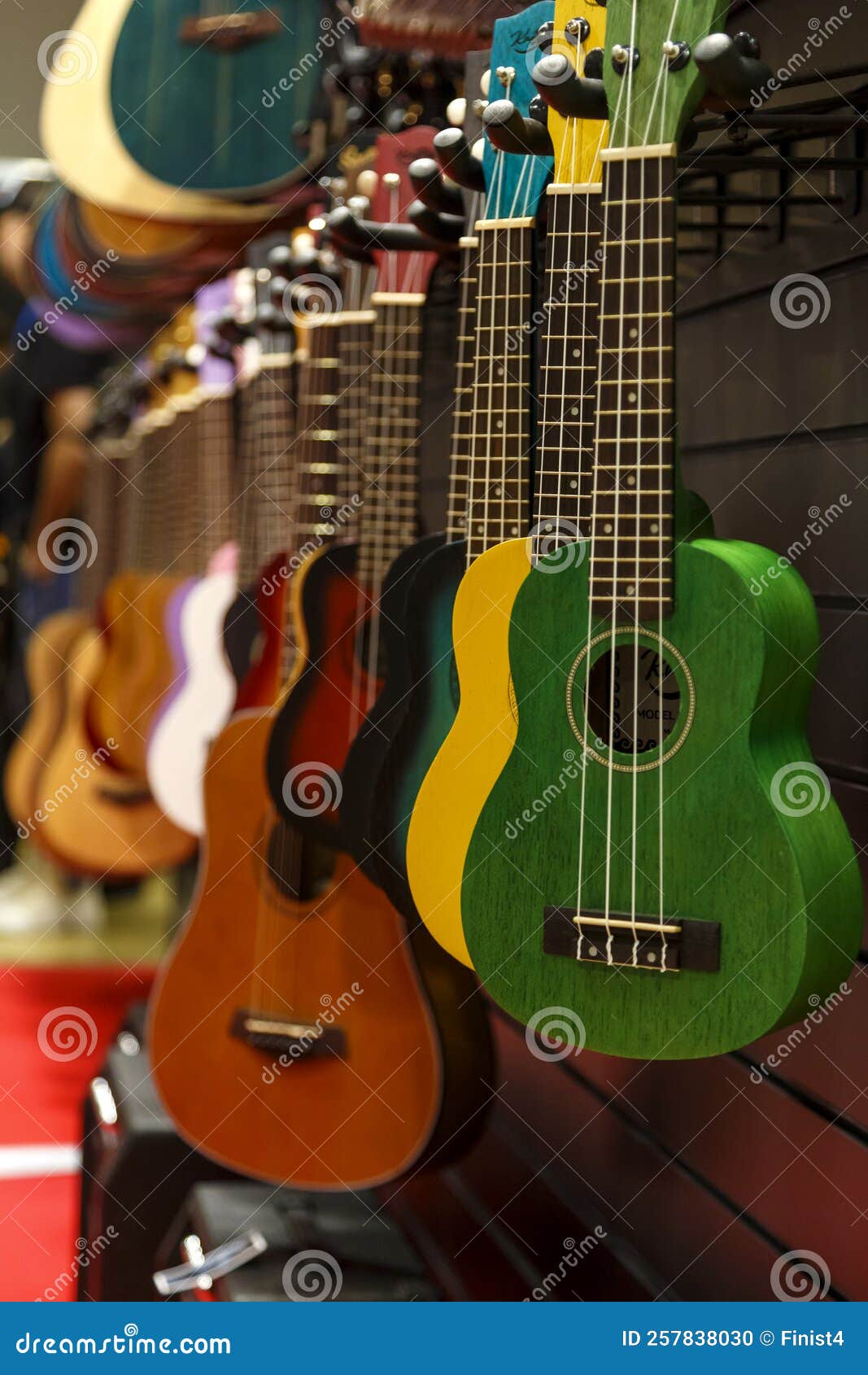 Various Guitars of Different Models Hang in the Store for Sale Stock ...