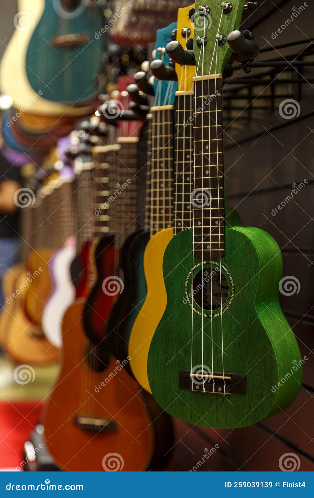 Various Guitars of Different Models Hang in the Store for Sale. Stock ...