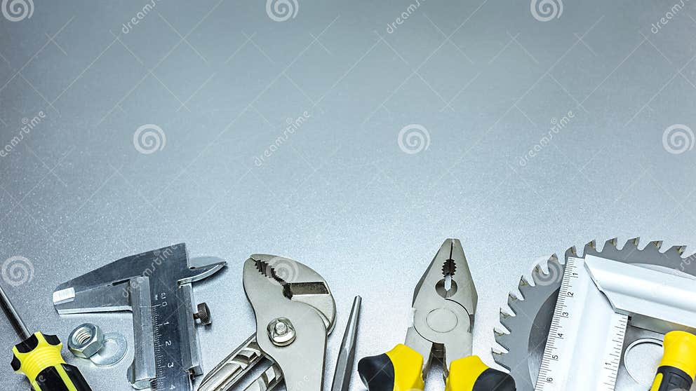 Various Hand Tools on a Grey Metal Background Stock Image - Image of ...