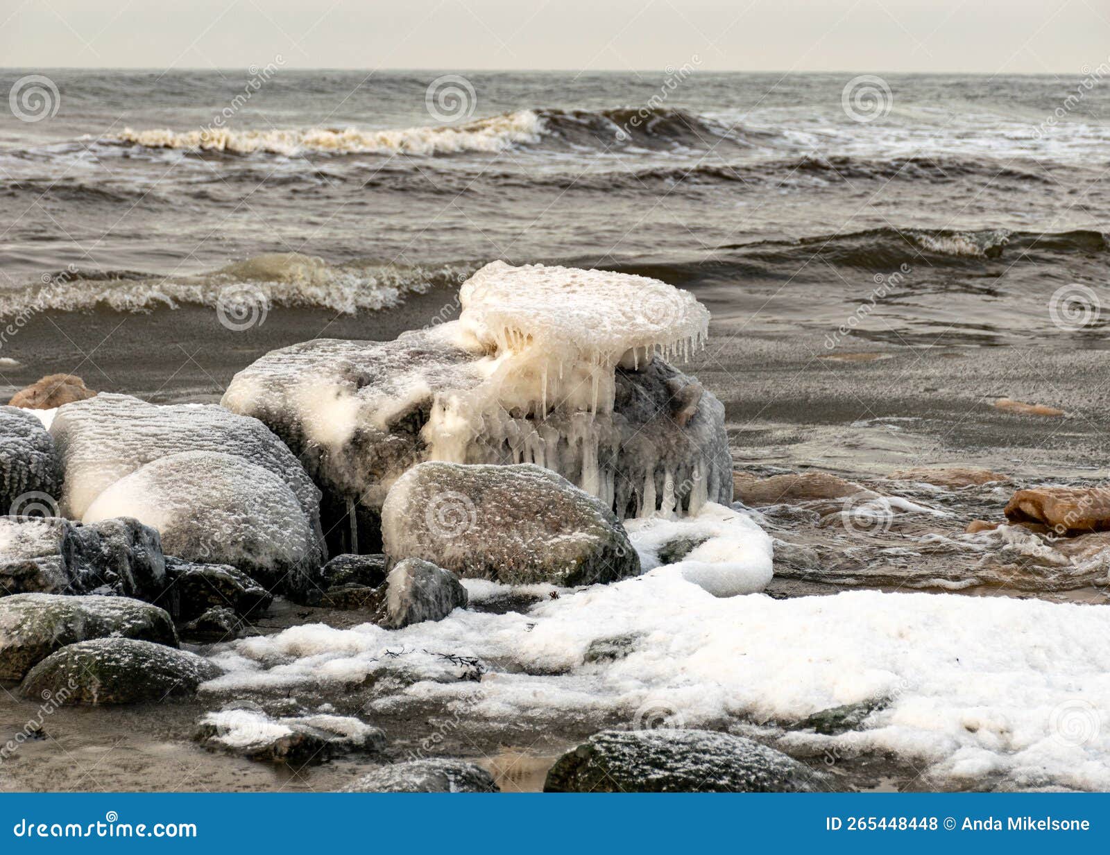 Various Ice Formations on Rocks and Sandbars on the Seashore, Ice ...