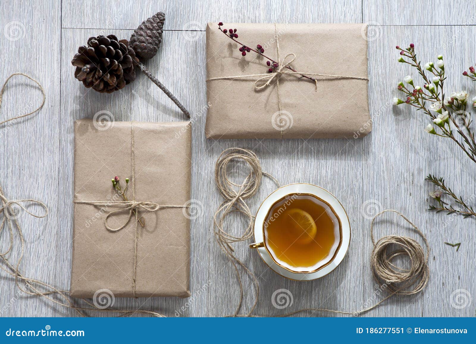 Various Items for Gift Wrapping are on Table. Gifts Already Packed ...