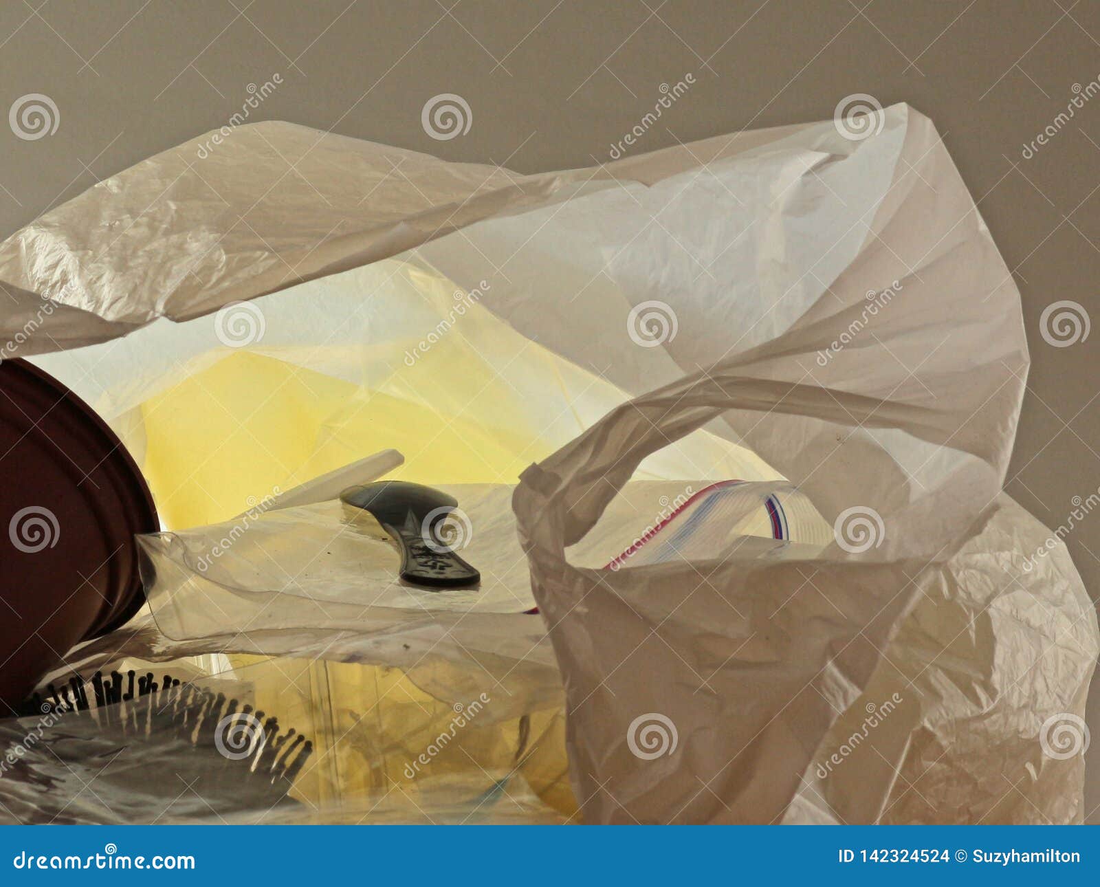 Plastic Rubbish in Clear Plastic Bag Lying on a Flat Surface Stock ...